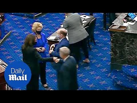 Lindsey Graham gives Kamala Harris a fist bump on Senate floor