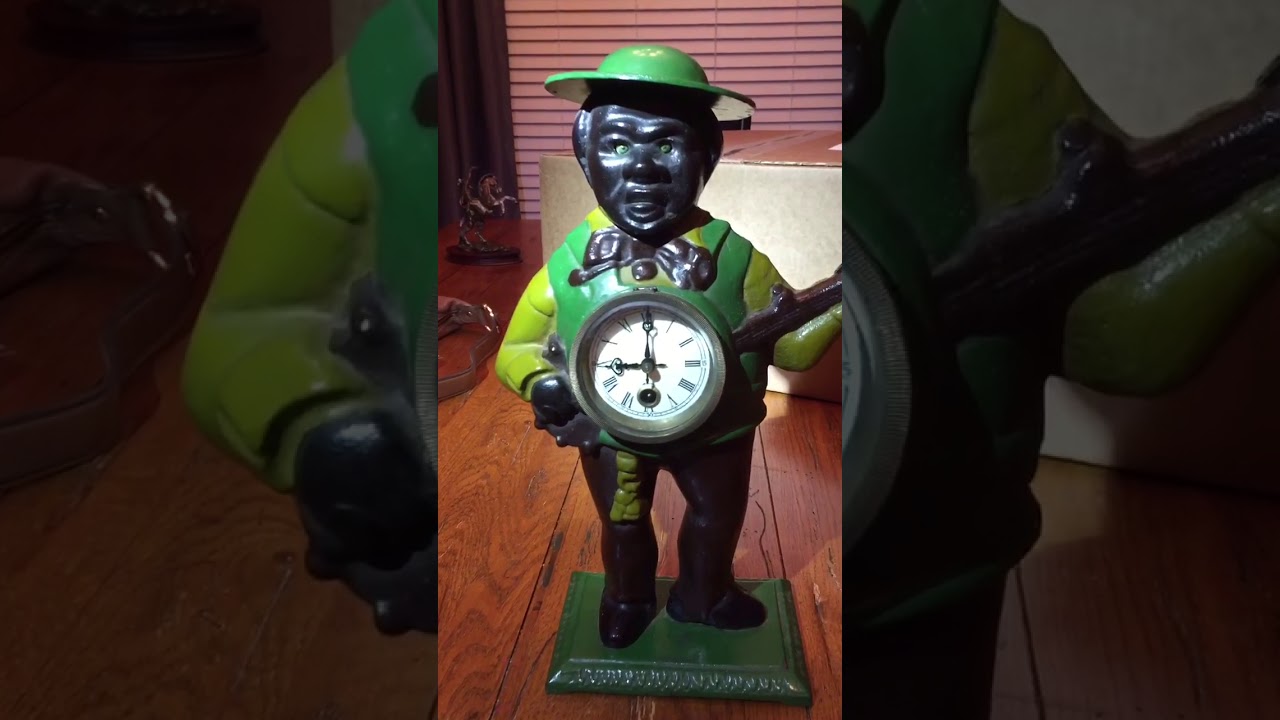 ANTIQUE SAMBO CLOCK BLINKING EYES - YouTube