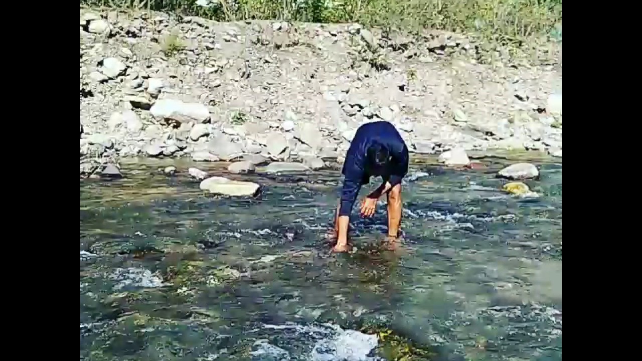 Gold stones in Ganga river - YouTube