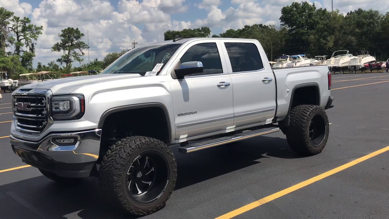 2016 Gmc 1500 slt lifted 9 inches on a McGaughys lift 375/45/22nittos ...