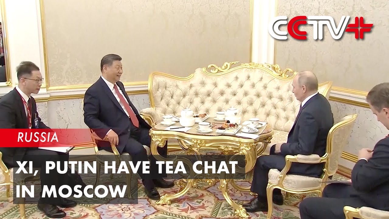 Xi, Putin Have Tea Chat in Moscow - YouTube