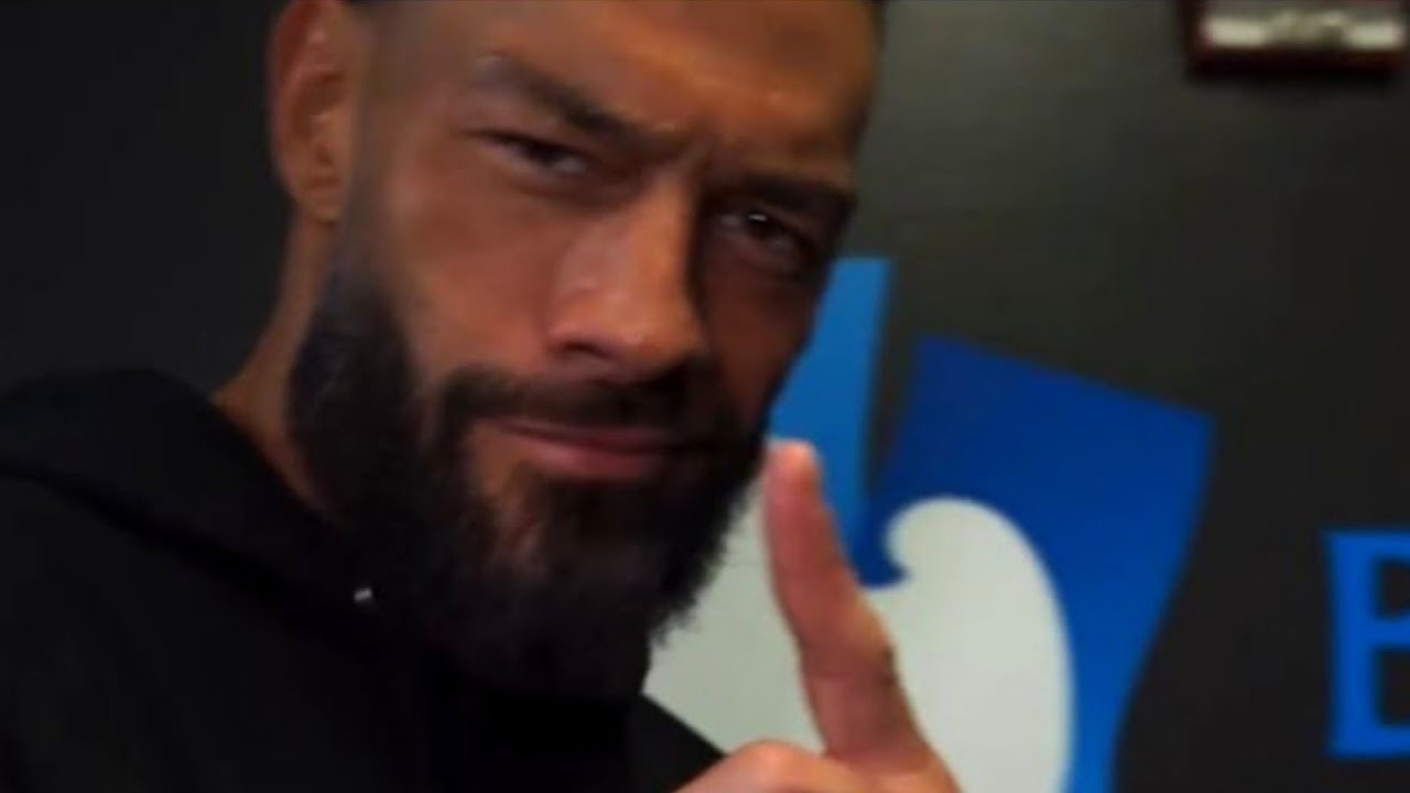 Roman reigns looks really happy modeling backstage on WWE RAW - YouTube