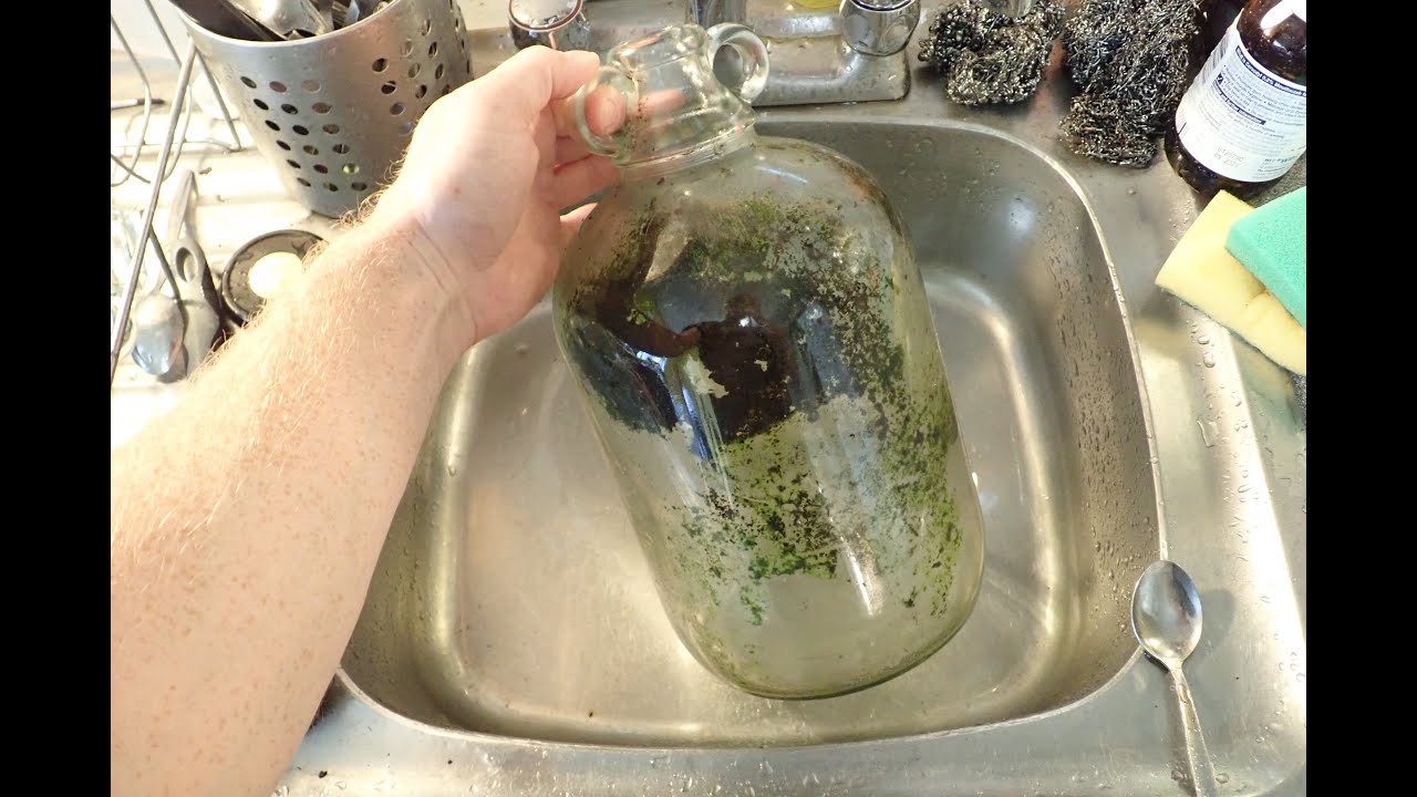 Cleaning Demijohns with ball bearings - YouTube