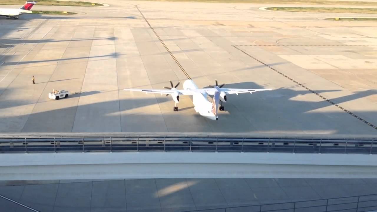 United Express Bombardier Dash 8 Q-400 full pushback, start - YouTube