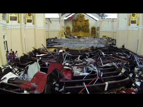 Unusual storms hit Sydney, typhoon threatening Philippines weakens