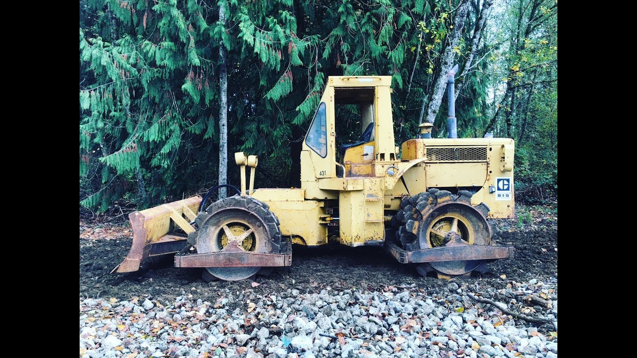 CAT 815 COMPACTOR - YouTube