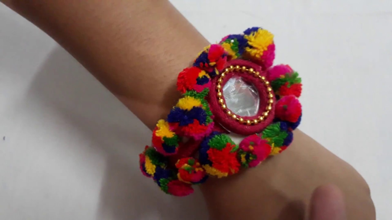 DIY pom pom bracelet for navratri - YouTube
