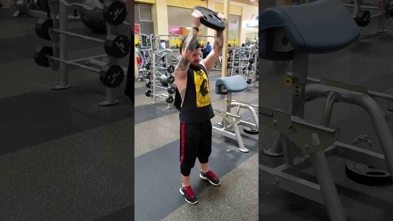 Plate front raises - YouTube