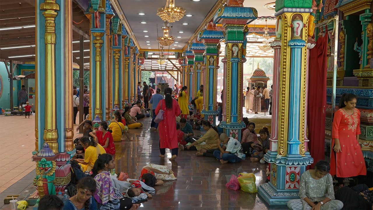 Parallax tracking of crowded Hindu religious temple with people ...