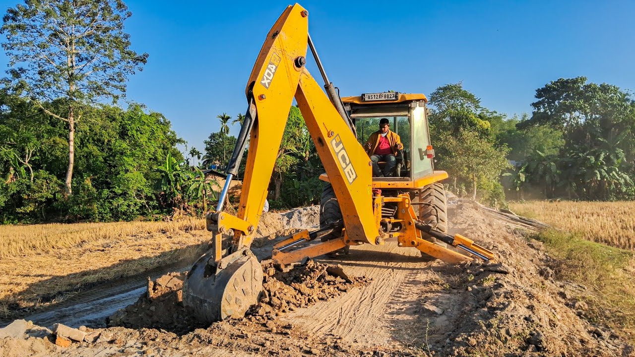 JCB 4DX Eco Xpert Backhoe Loader Machine New Road Making Work - YouTube