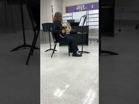 Liam playing a french horn solo for solo and ensemble - YouTube