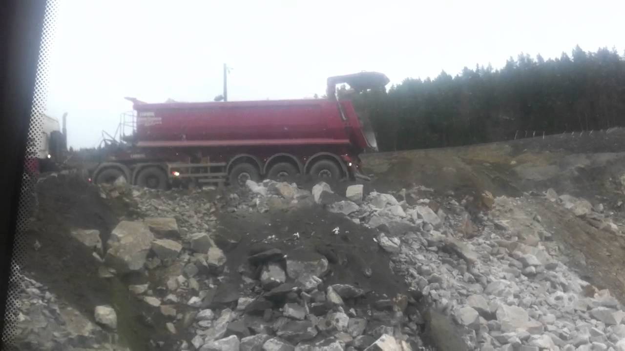 Semi trailer tipping stone. - YouTube
