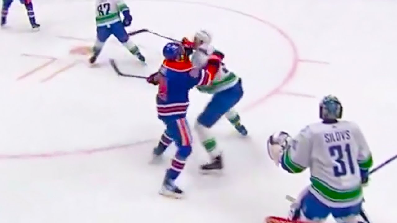 Evander Kane Cross Checks Tyler Myers in the Face | Oilers vs Canucks ...