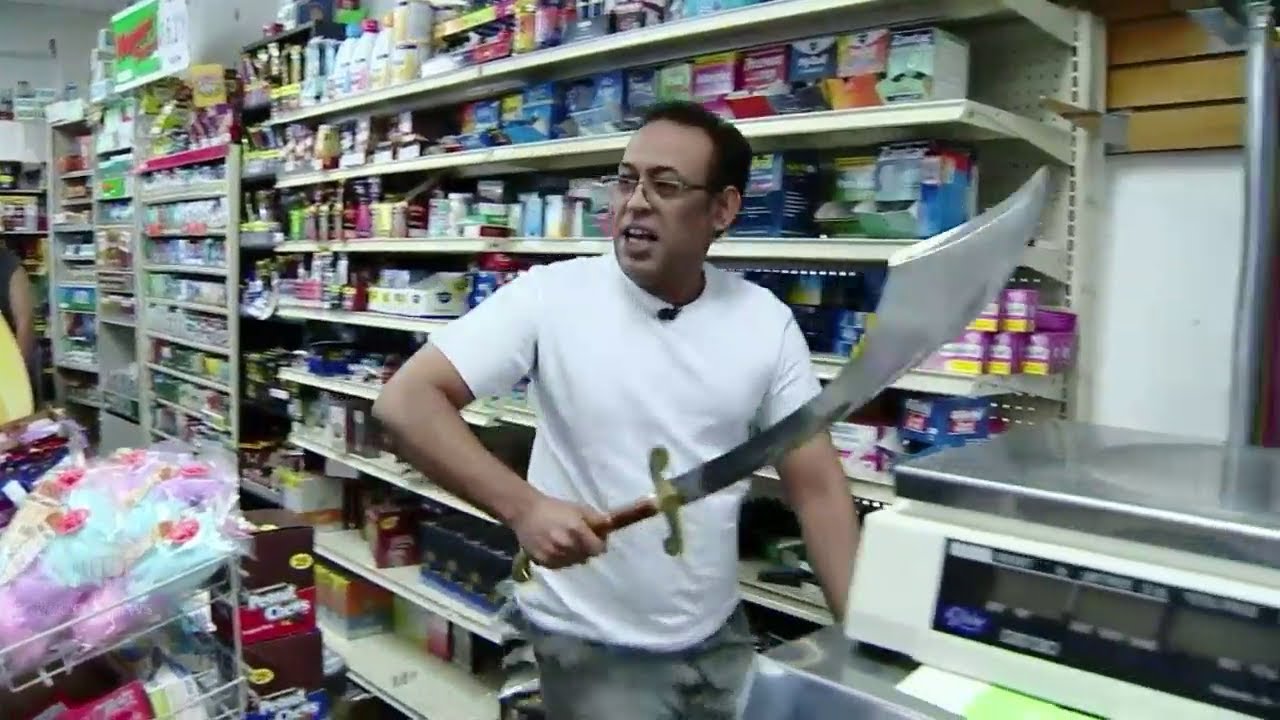 Cashier fights off sword-wielding robber with BIGGER sword - YouTube