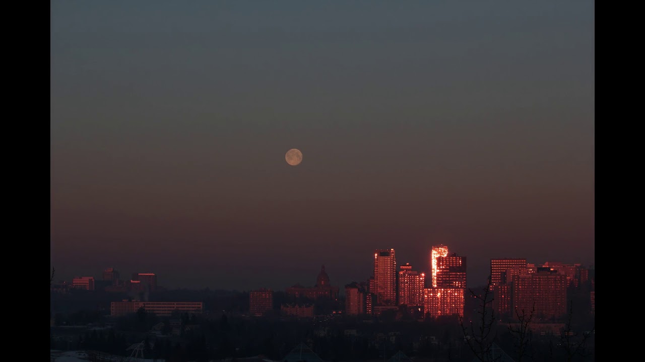 Sunrise Reflections at Equinox Moonset: A Time-lapse - YouTube