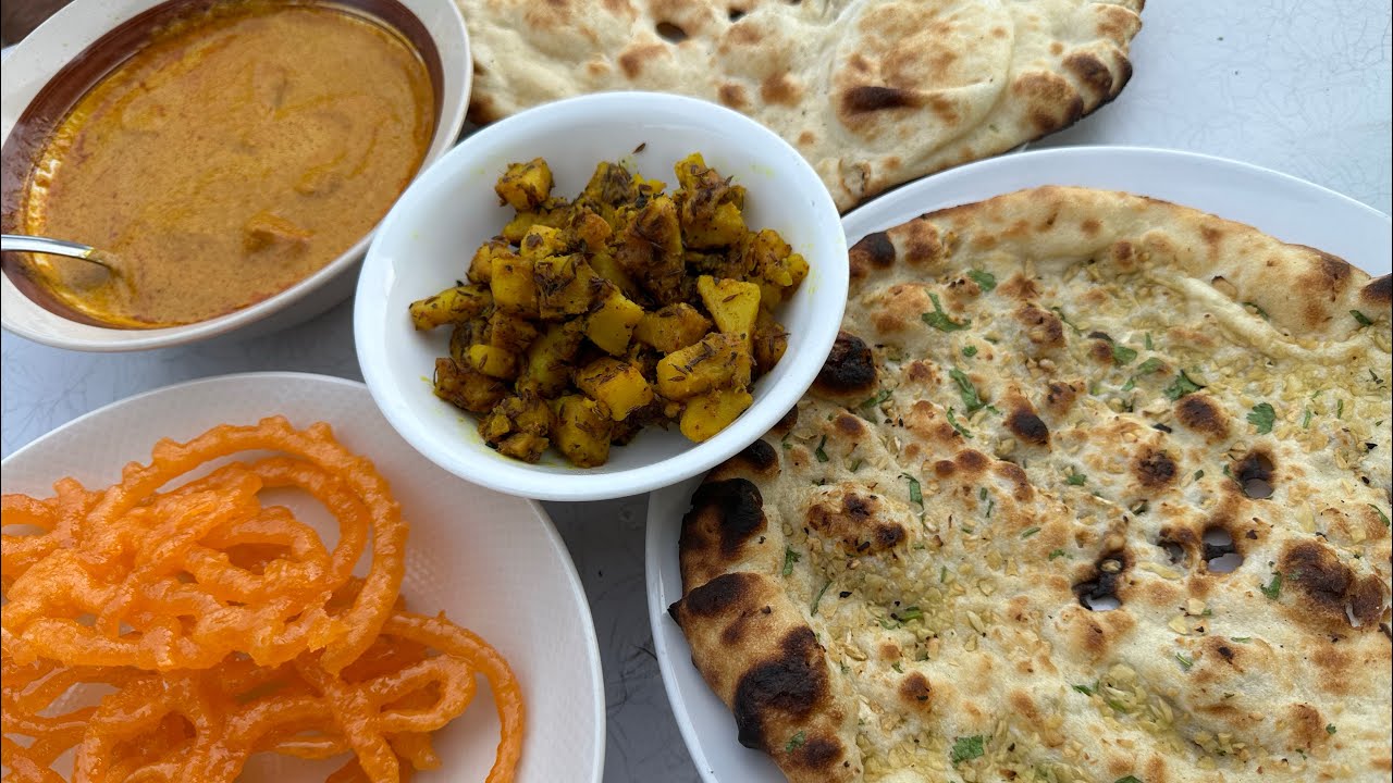 Eating Garlic Naan, Shai Paneer, Aloo, Jalebi Indian Food | Catering ...