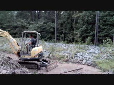 Yanmar Mini Excavator cleaning out a pond - YouTube