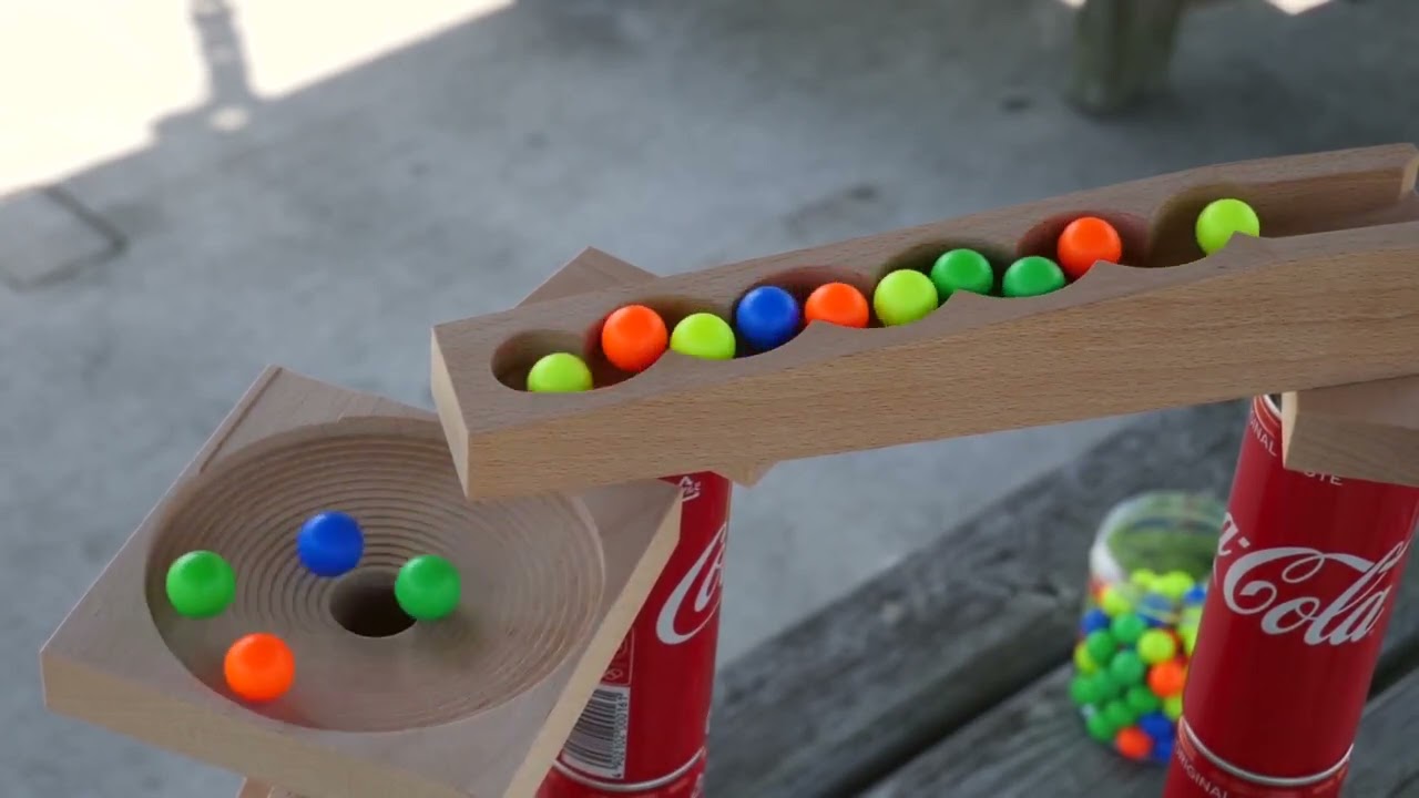 50 Marble balls running down on tiny wooden track - YouTube