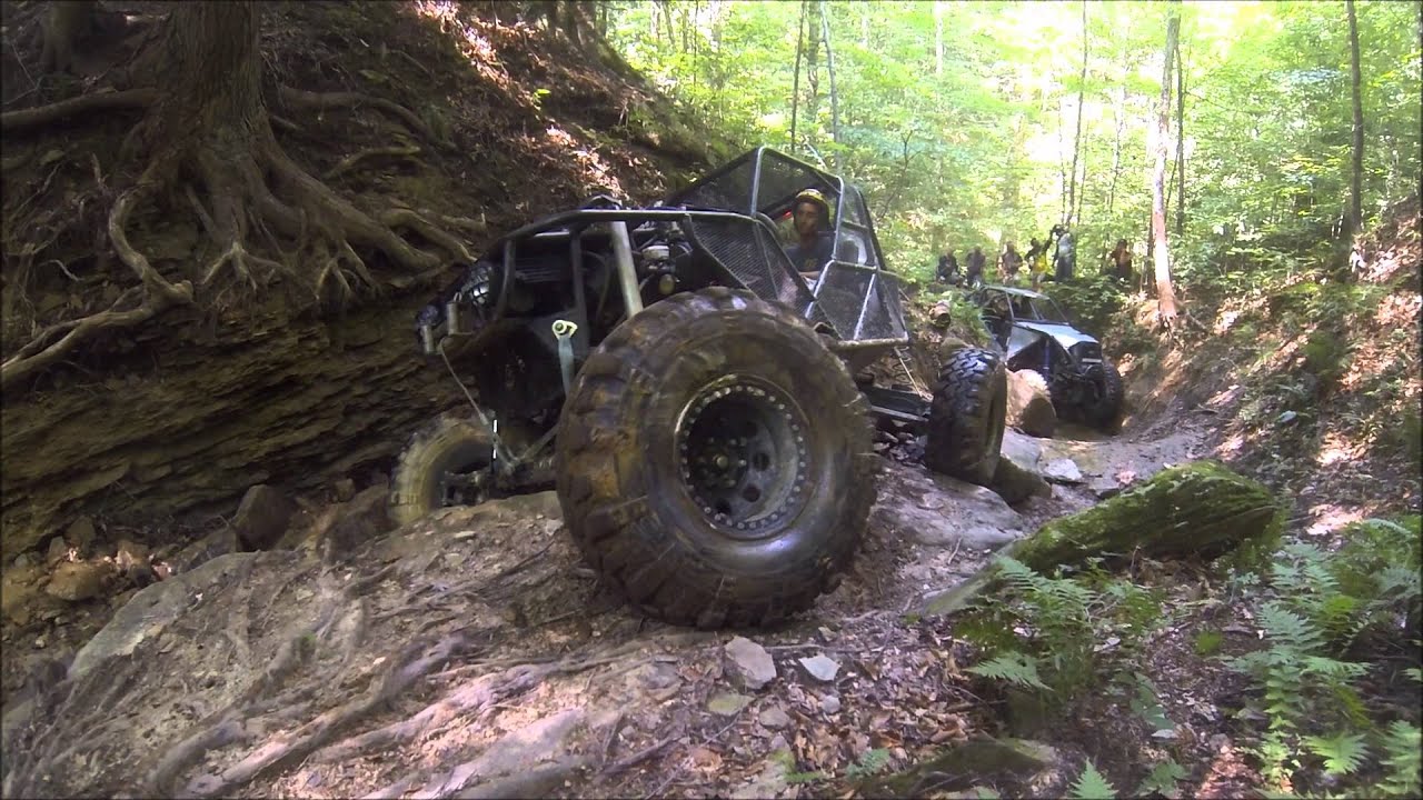 40 inch LTB Super Swampers in rocks - YouTube