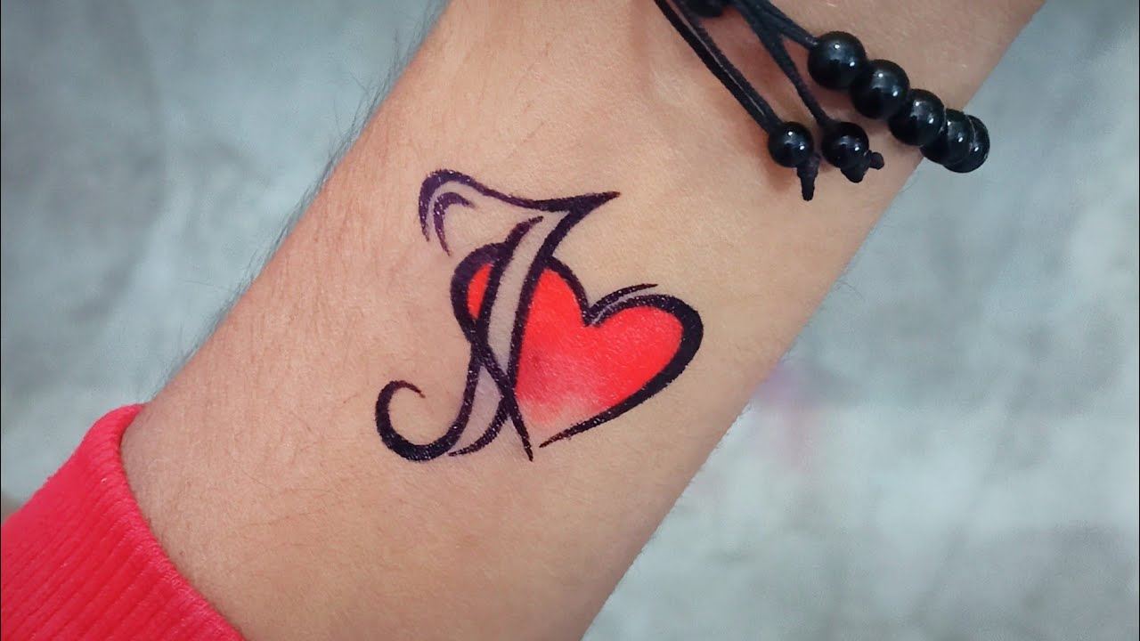 Cursive Letter J Tattoo
