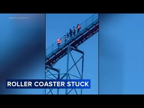 Roller coaster riders forced to walk down tracks after malfunction