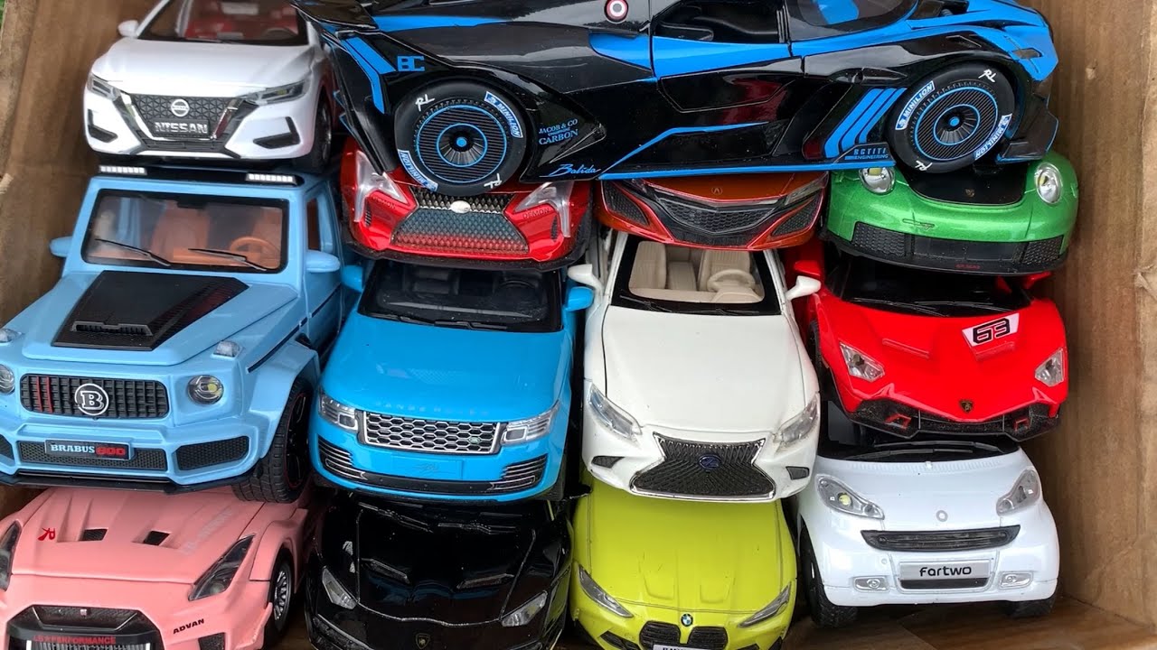 Box Full of Model Cars -Porsche 911, Brabus 800, Bugatti Bolide ...