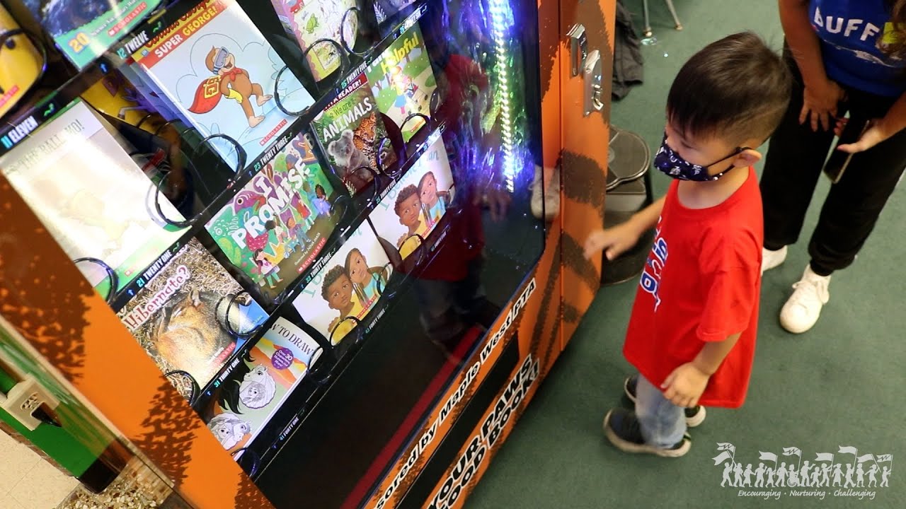 District Spotlight -- Book Vending Machine (Maple West) - YouTube