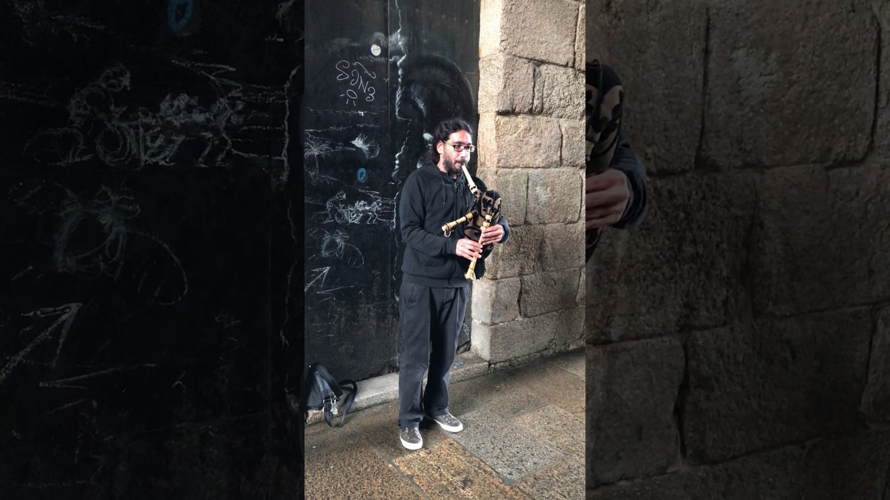 Galician bagpipe player as you enter the Cathedral Square - YouTube