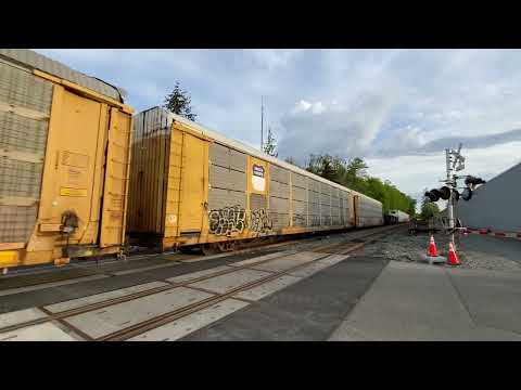 Union Pacific Mixed Freight Train passes South 19TH Street Railroad Crossing. Milepost 10.1 ...