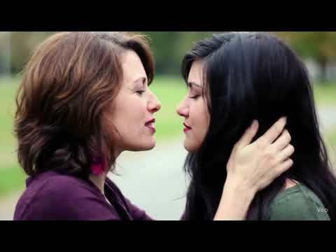 Woman kissing each other - YouTube