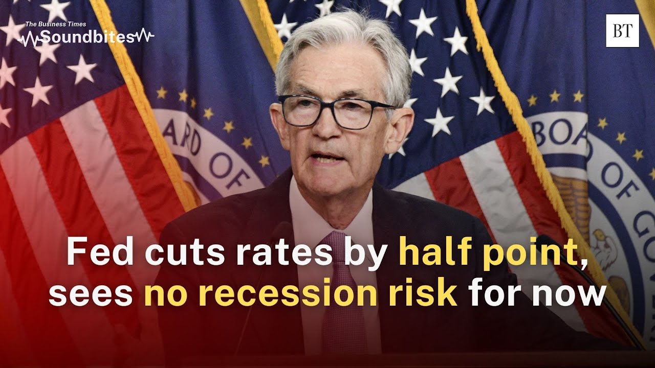 Fed cuts rates by half point, sees no recession risk for now - YouTube