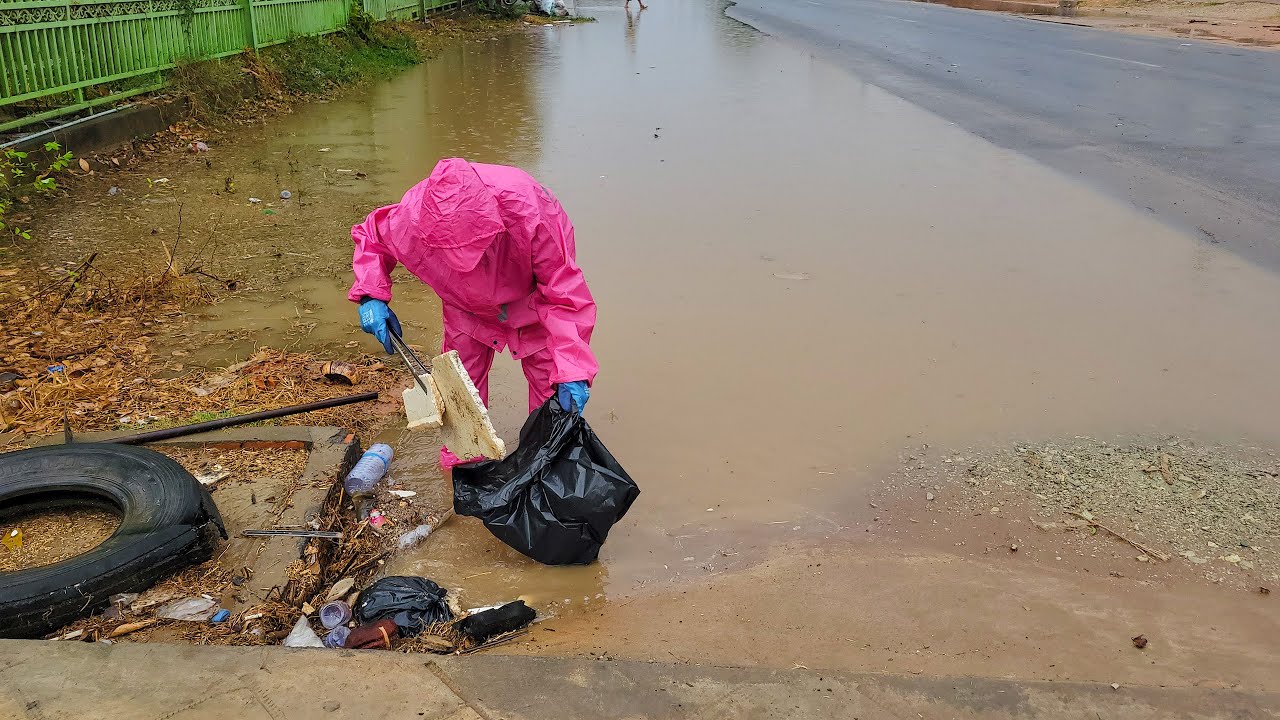 Clogs Clogged Culvert Drain On Road Removing Lots Of Debris In Drain ...