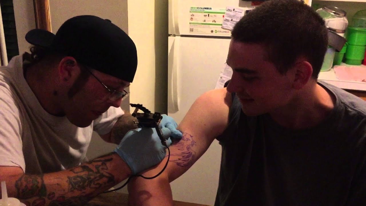 My son getting his first tattoo - YouTube