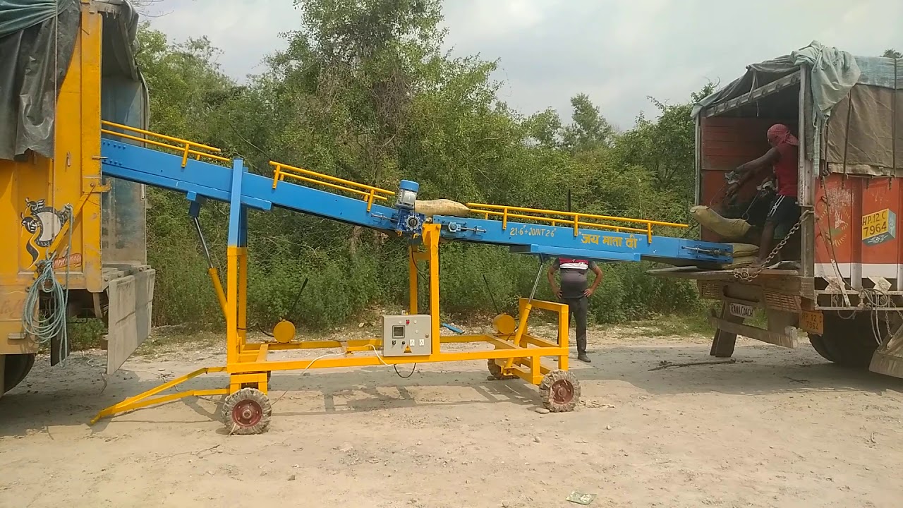 Truck loader machine - YouTube