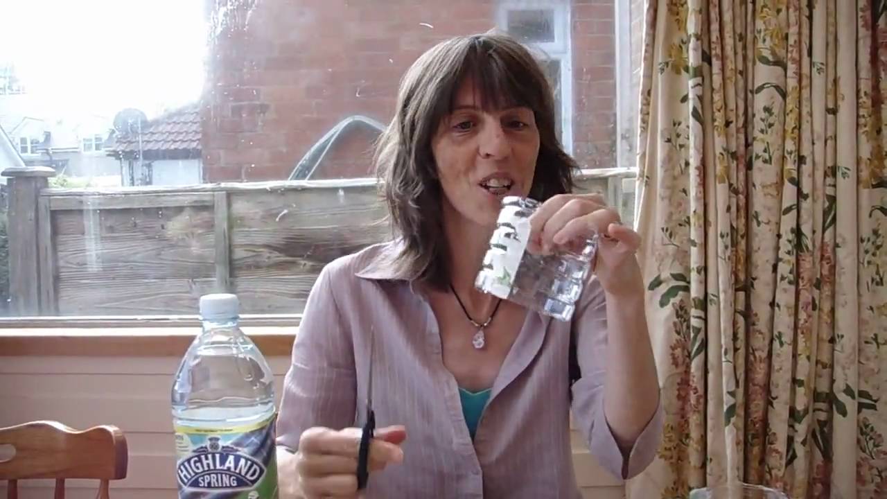 Reusing plastic bottles as slug deterrents - YouTube