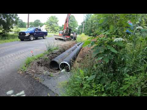 Installing double culvert pipes - YouTube