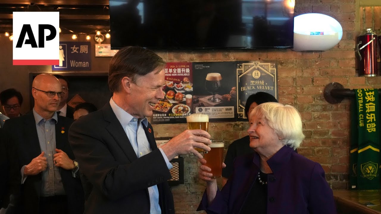 Yellen enjoys a beer made with American hops at a Beijing brewery - YouTube