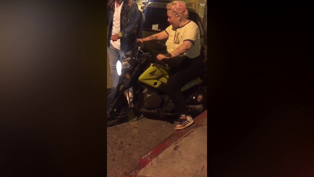 Woman Loses Control of Motorcycle and Crashes - YouTube