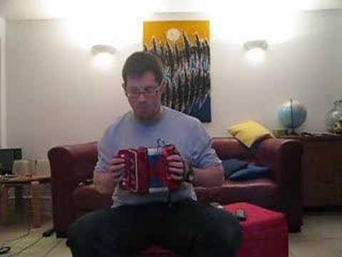 Dour man plays jaunty melodeon - YouTube