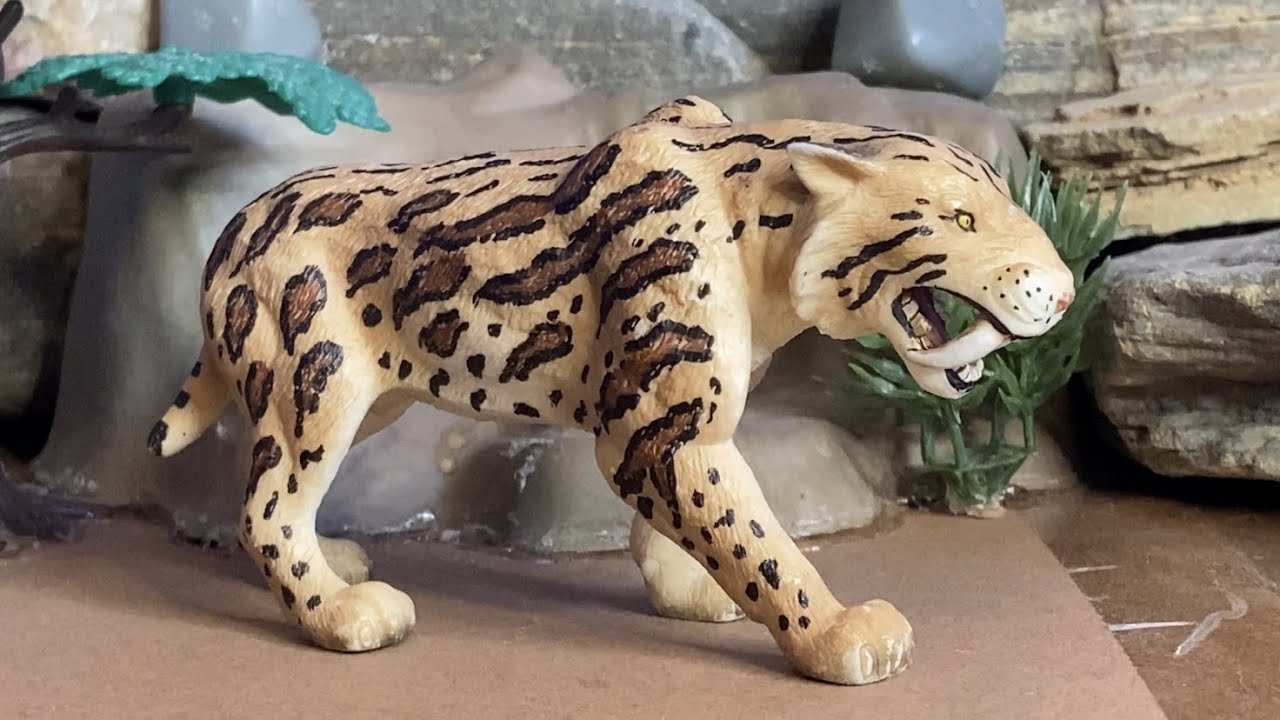 Mojo Smilodon Figures - YouTube