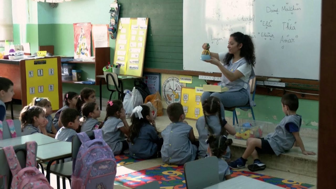 Beirut pupils return to class as some private schools reopen, despite ...