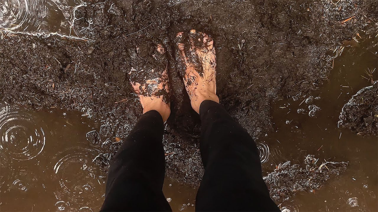 Barefoot in mud on a rainy hike - YouTube