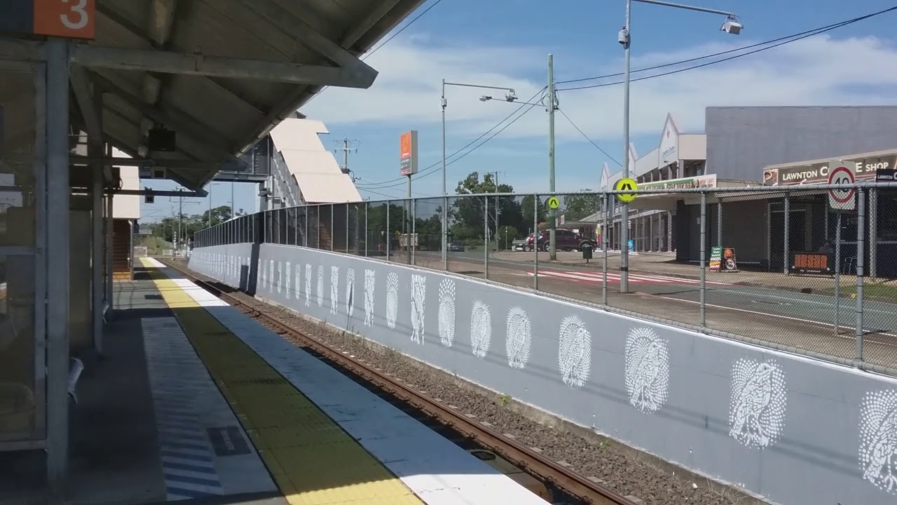 RM1901 passes through Lawnton Station testing the line on #N1A1. - YouTube