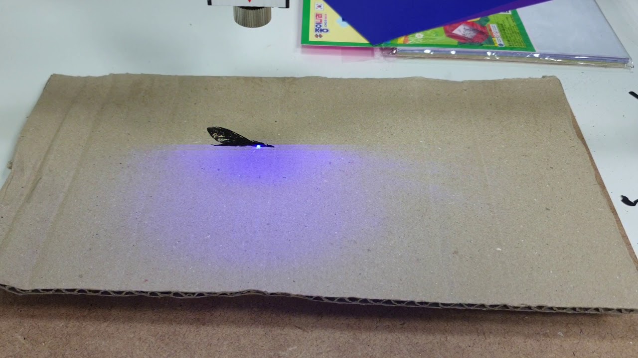 Laser engraving on paper - YouTube