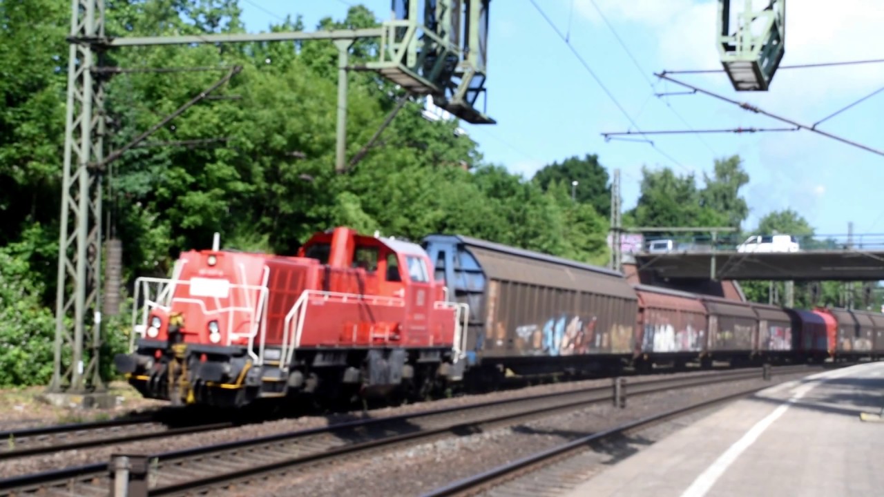 Deutsche Bahn Diesel Switcher Leads a Boxcar Train thru Hamburg ...