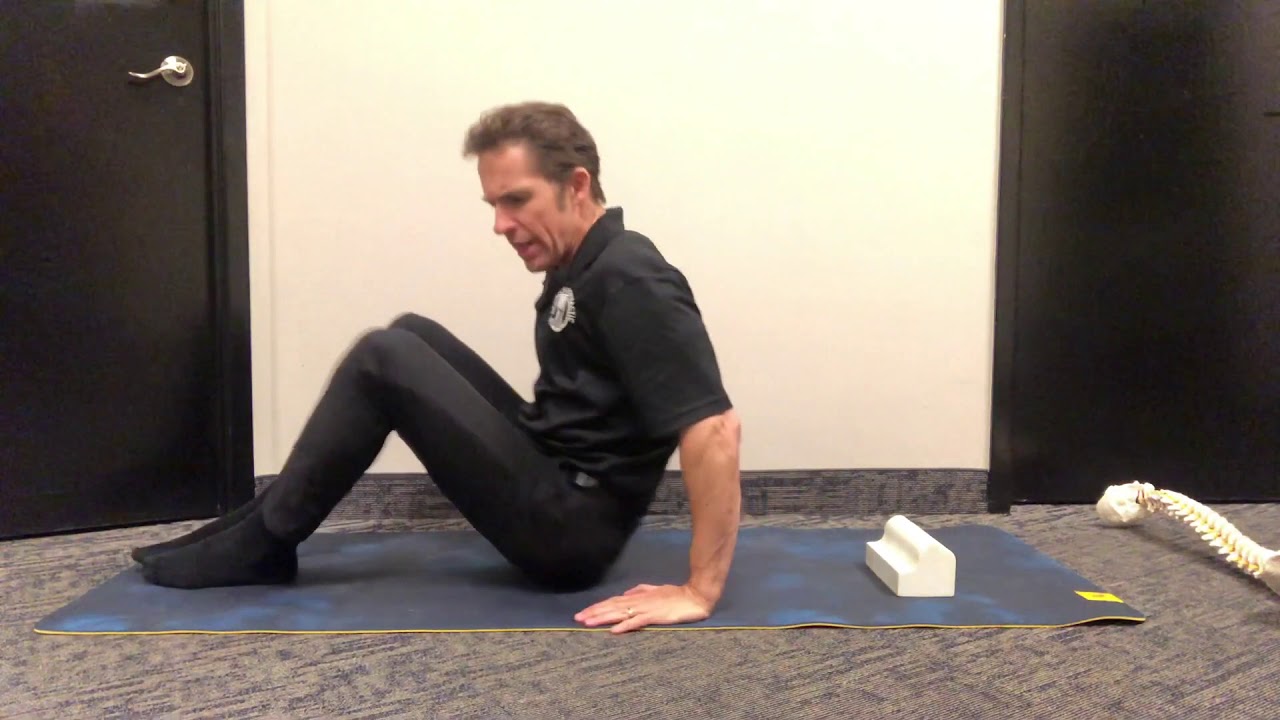 Guelph Chiropractor Dr Brent Lipke shows how to use a Denneroll to ...