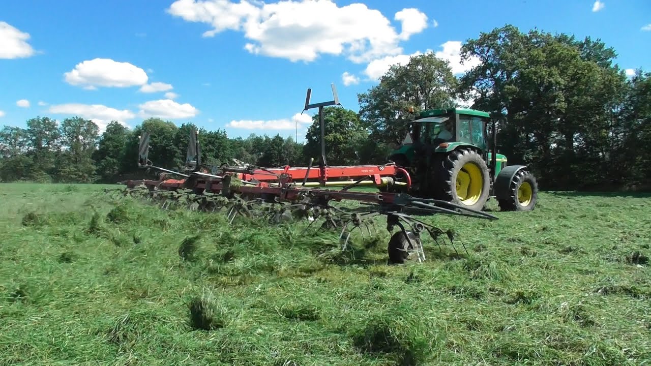 Tedding silage with JD & Vicon - YouTube