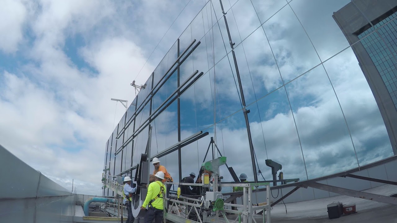 First piece of VyStar Tower sign installed - YouTube