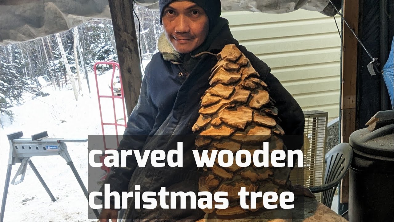 Chainsawcarved christmas tree #chainsawcarving #woodworking - YouTube