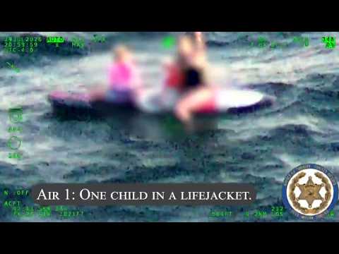 Mother and 2 young daughters stranded on a paddleboard were rescued on Lake Erie